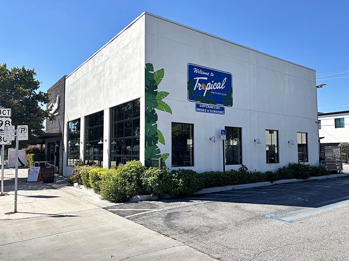 The clean white exterior of Tropical Smokehouse belies the flavor explosion waiting inside. Florida sunshine and BBQ—a match made in culinary heaven.
