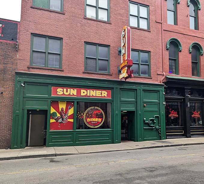 That green storefront and vintage neon sign are like a beacon calling you home to breakfast paradise.
