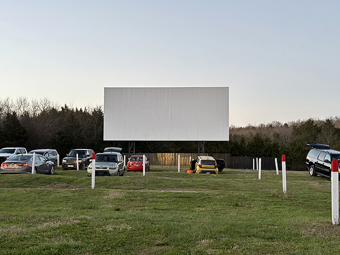 The blank canvas awaits its nightly transformation. During daylight, it's just a screen; after dusk, it becomes a portal to other worlds.
