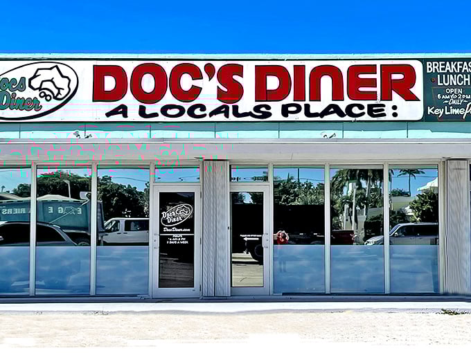 The unassuming storefront of Doc's Diner proudly declares itself "A Local's Place" – the Keys equivalent of finding the secret password to culinary paradise.