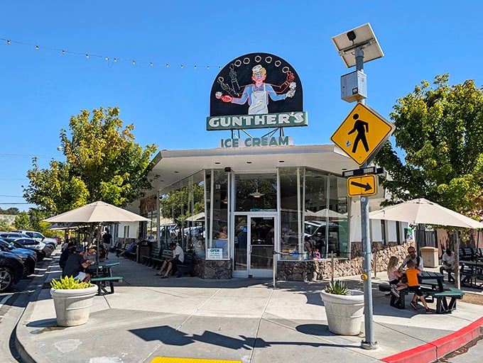The iconic Gunther's storefront stands like a mid-century time machine, complete with that hypnotic neon sign promising frozen bliss.