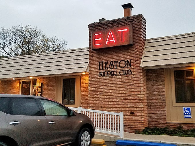That same commanding "EAT" sign at dusk, when the red neon transforms from suggestion to imperative. Resistance is futile—and why would you want to resist?