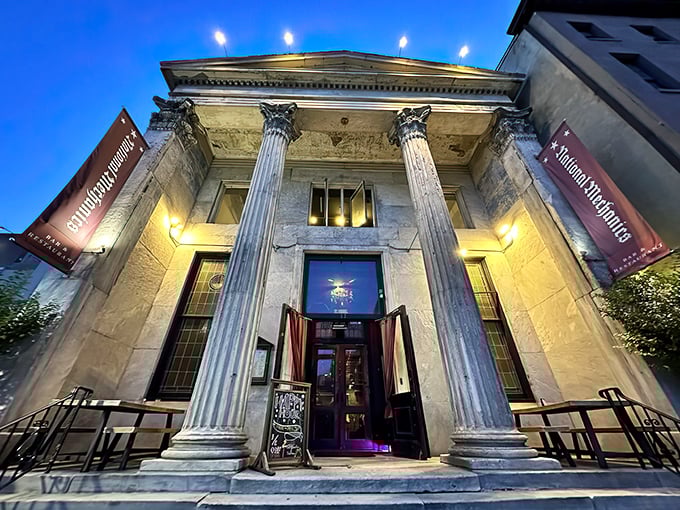 Banking on a good meal? This Greek Revival façade isn't guarding gold anymore—unless you count those golden-fried chicken wings waiting inside.