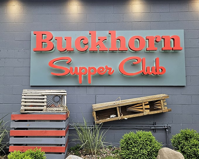 The iconic red lettering against blue-gray siding isn't just a sign—it's a beacon of hope for hungry travelers seeking Wisconsin's supper club salvation.