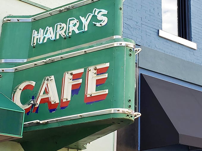 Harry's vintage neon signage glows with the promise of comfort food that hasn't changed with the times – because perfection doesn't need updating.