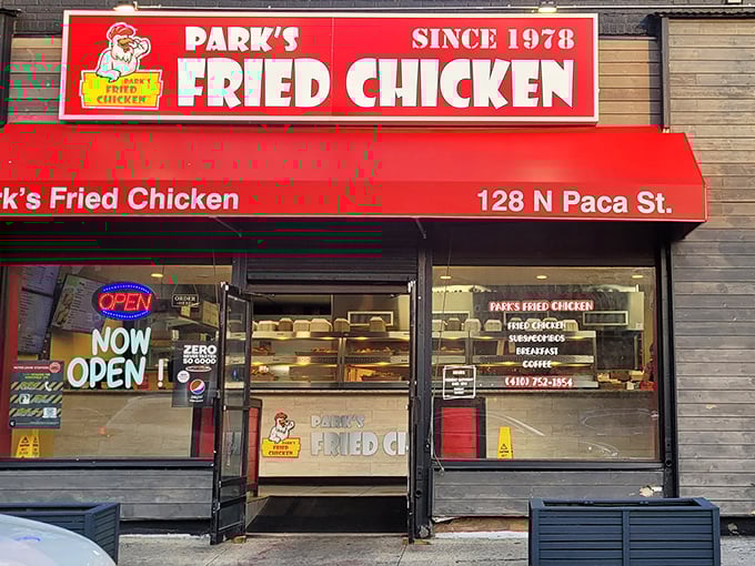 The bright red storefront of Park's Fried Chicken on N Paca St stands like a beacon to hungry Baltimoreans. Fried chicken salvation awaits inside.