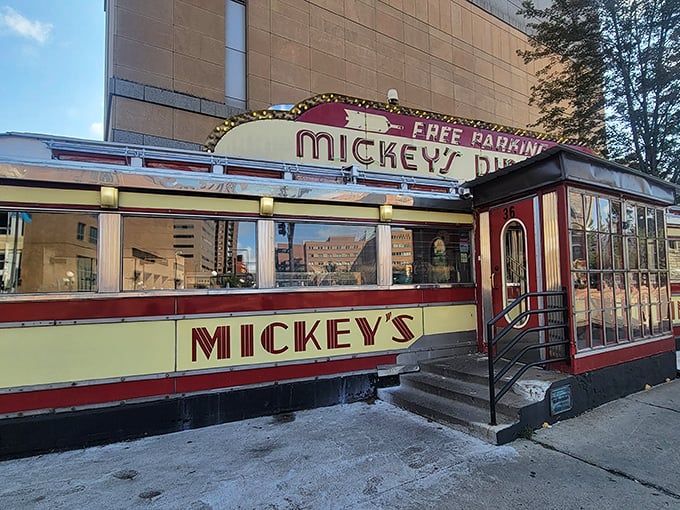 Like a time machine disguised as a dining car, Mickey's iconic red and yellow exterior promises nostalgic comfort with every visit.
