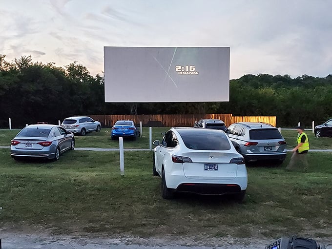 Modern cars line up before the massive screen, where "2 remaining" flashes—the most thrilling countdown in Tennessee entertainment.