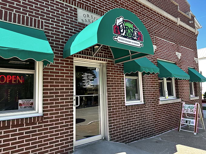 That green awning marks the spot where Nebraska's pizza game reaches heights other states only dream about achieving.