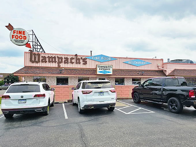 That iconic pink exterior and vintage "FINE FOOD" sign aren't just retro charm—they're a beacon of breakfast hope for hungry Minnesotans seeking comfort food salvation.