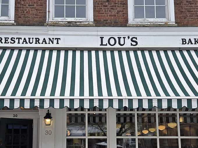 That iconic green and white striped awning isn't just decoration—it's a beacon of breakfast hope on Hanover's Main Street, promising culinary salvation to hungry souls.