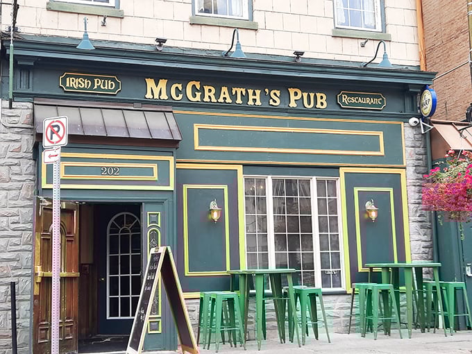 McGrath's second exterior view showcases its sidewalk seating area, where green metal stools invite passersby to stop for a pint on pleasant Pennsylvania days.