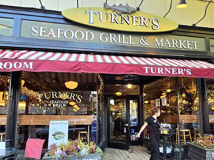 That red and white striped awning isn't just decoration – it's a beacon calling you home to serious seafood.