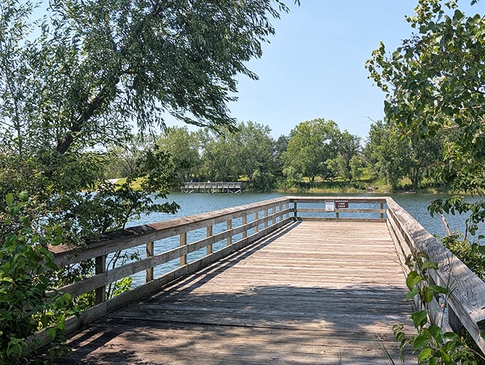 This wooden dock invites contemplation like a therapist's couch with a much better view—where the only thing you'll be charged for is taking too many deep breaths of serenity.