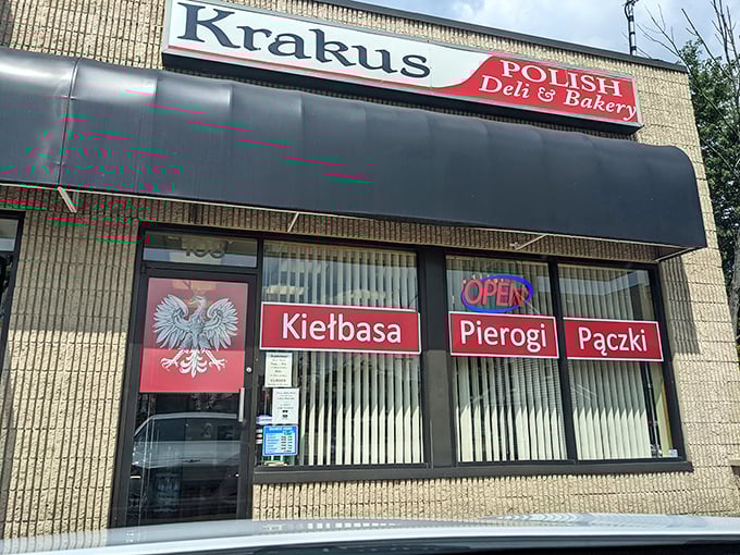 The storefront beckons with its bold red signage and iconic Polish eagle emblem. Kiełbasa, Pierogi, Pączki – a trifecta of deliciousness awaits inside.