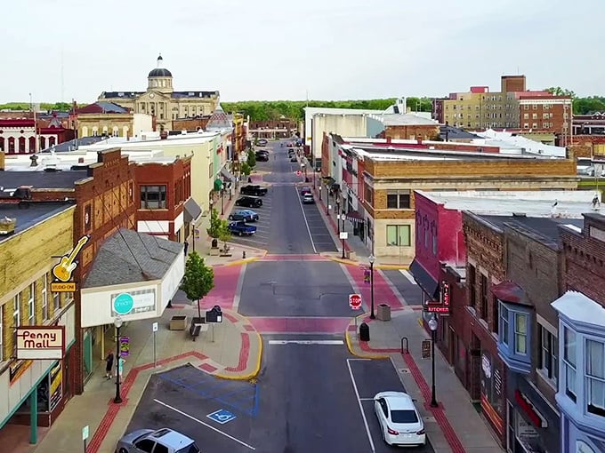 Downtown Huntington unfolds like a Norman Rockwell painting come to life, with the majestic courthouse dome watching over the colorful storefronts below.