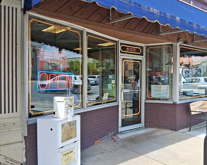 The unassuming storefront of Larrison's Diner beckons with its vintage charm and neon "OPEN" sign—proof that culinary treasures often hide in plain sight.