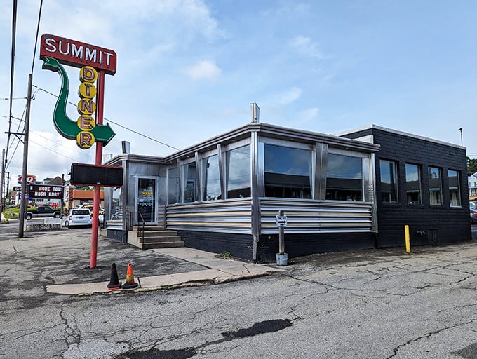 The iconic Summit Diner sign stands tall against the Pennsylvania sky, a neon beacon calling hungry travelers home like a culinary lighthouse.