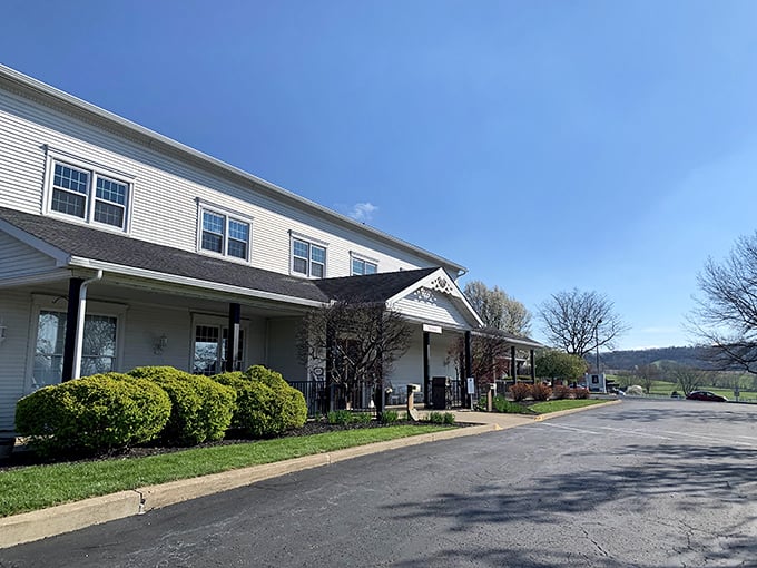 The exterior view showcases the Amish Door's expansive white clapboard design. Like a Norman Rockwell painting come to life, it stands proudly against Ohio's blue skies.