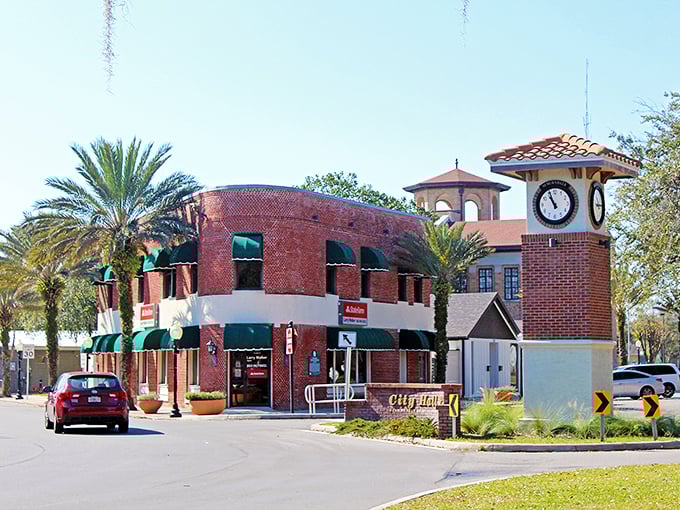 Auburndale's iconic clock tower stands sentinel over brick buildings and palm trees – small-town Florida charm with a dash of timeless elegance.