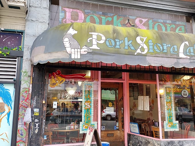 The weathered awning of Pork Store Cafe stands as a colorful beacon on Haight Street, promising breakfast salvation to hungry San Franciscans since before Instagram was invented.