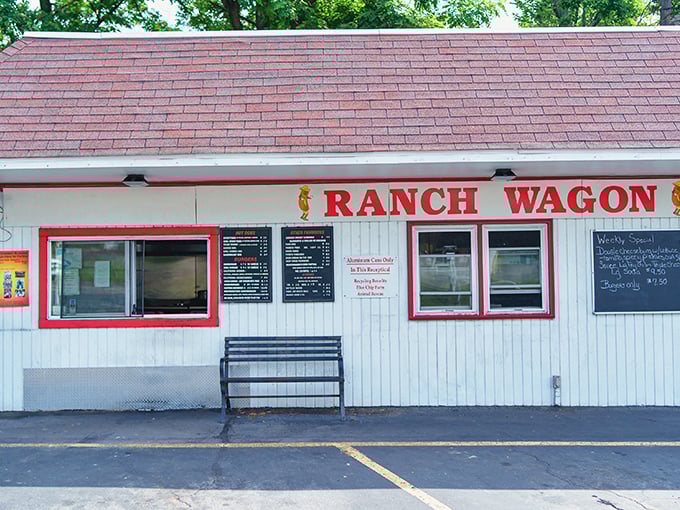 The humble white building with red trim might not look like much, but this unassuming roadside spot houses hot dog magic that locals have treasured for generations.