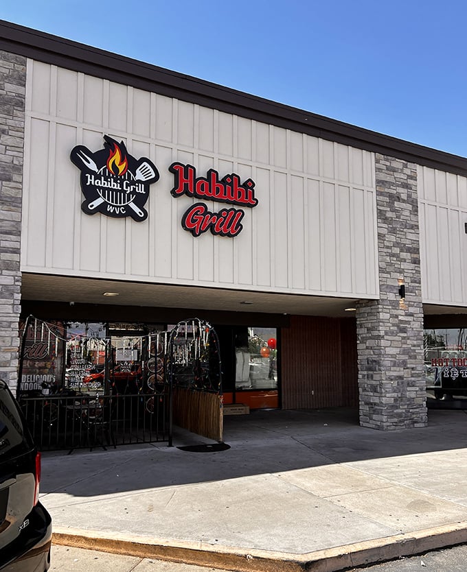 The storefront might be modest, but that flame logo isn't lying—what happens inside is pure fire.
