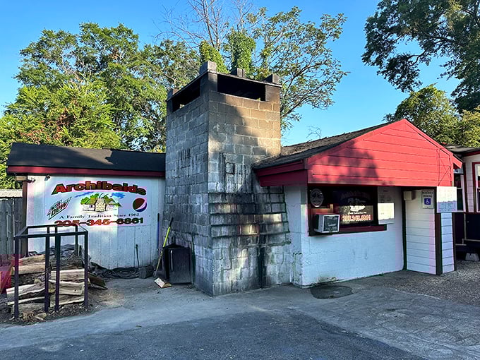That cinder block chimney isn't just for show—it's been pumping out aromatic smoke signals for decades.