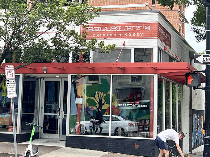 The corner brick building with its vintage-style signage and red awning beckons like a siren song to fried chicken aficionados throughout Raleigh. 