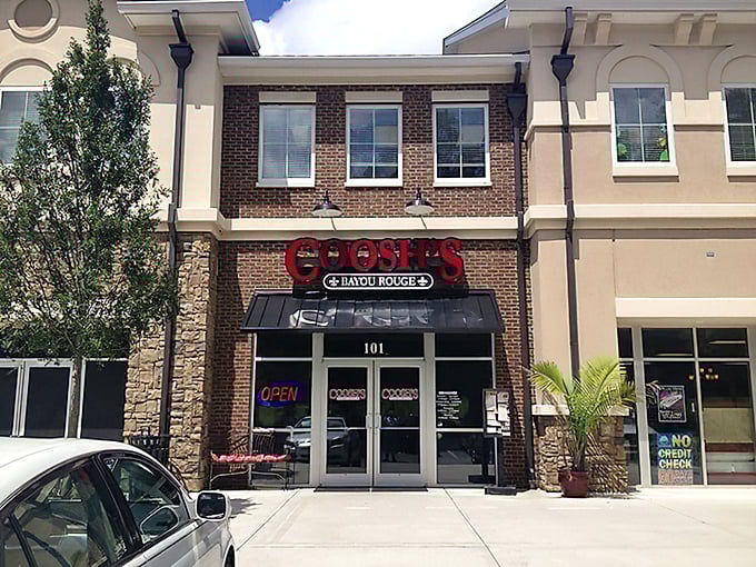 That red neon sign beckoning from the strip mall isn't selling insurance, it's your gateway to Louisiana.