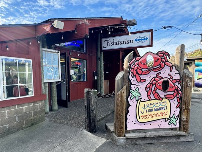 The bright orange exterior of Fishetarian isn't just a building—it's a coastal beacon calling to seafood lovers like a siren song to sailors.