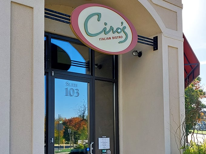 The welcoming facade of Ciro's Italian Bistro beckons with its distinctive coral awnings and lush greenery—like a little slice of Italy nestled in Lancaster.