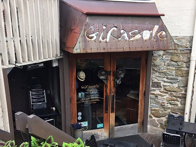 That copper awning whispers "come in" like an old Italian grandmother who knows you're hungry.