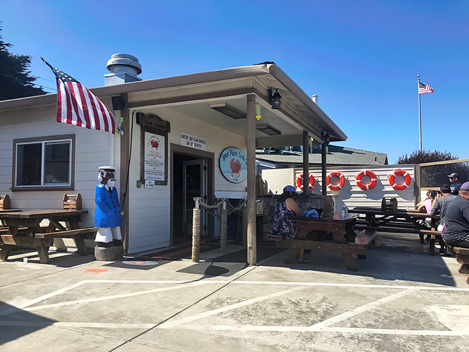 The unassuming white shack that quietly houses seafood greatness—like finding Shakespeare performing in a garden shed: humble exterior, extraordinary experience.