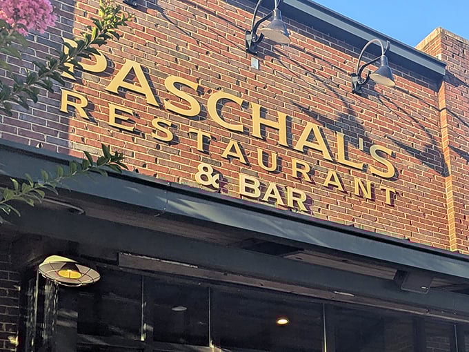 Golden letters gleaming against brick – Paschal's knows how to make an entrance that promises good things inside.