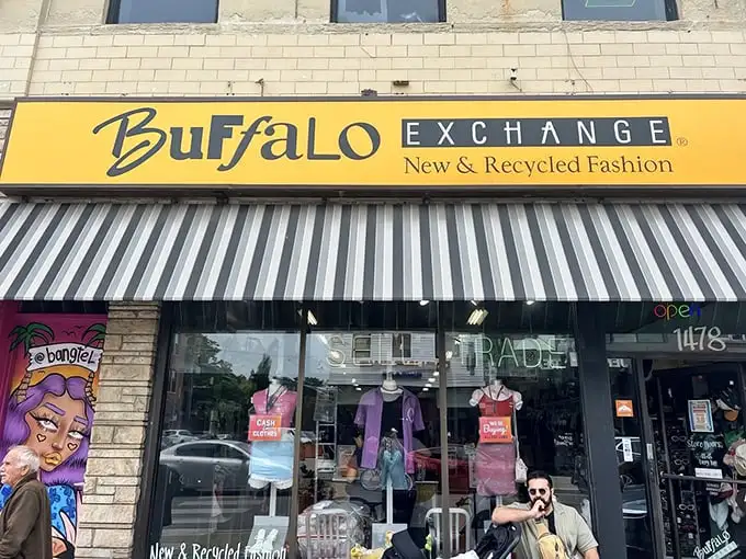 The iconic yellow storefront of Buffalo Exchange beckons fashion hunters with its "Buy, Sell, Trade" promise – a secondhand paradise in Wicker Park.
