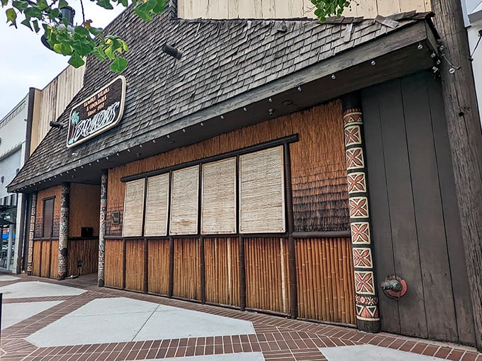 The tiki-themed exterior of Damon's stands like a tropical mirage on Brand Boulevard, promising Polynesian escape and carnivorous delights behind its bamboo façade.