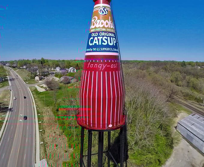 The Brooks Catsup Bottle stands tall against the Illinois sky, a 170-foot testament to America's love affair with quirky roadside attractions.