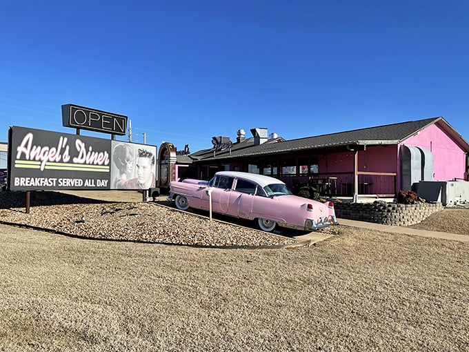 That classic pink Cadillac parked outside isn't just for show—it's setting the stage for the nostalgic feast awaiting inside this Oklahoma treasure.