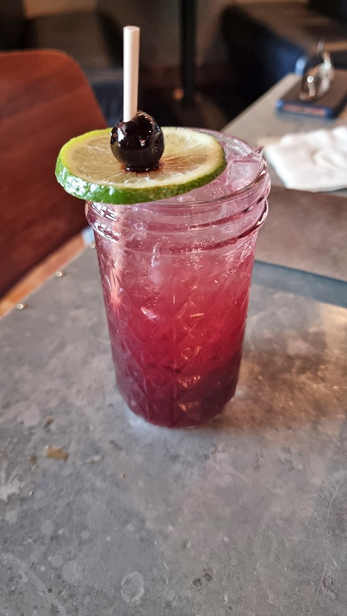 That vibrant cherry limeade isn't just for the kids—the adult version packs a punch that perfectly cuts through rich barbecue flavors.