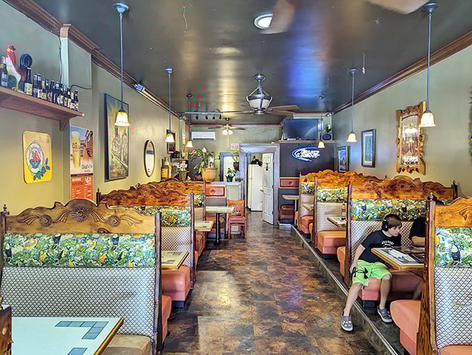 These wooden booths aren't just restaurant seating—they're front-row tickets to small-town Americana, served with a side of local conversation.