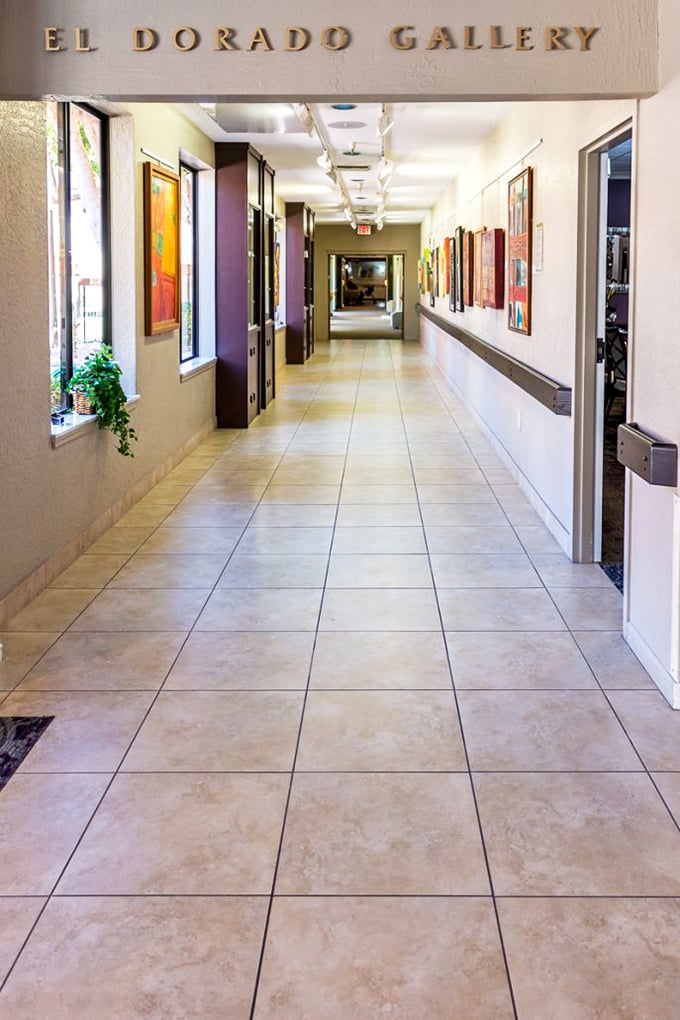 The El Dorado Gallery hallway: where residents debate whether that abstract painting is profound art or something their grandchild could have made.