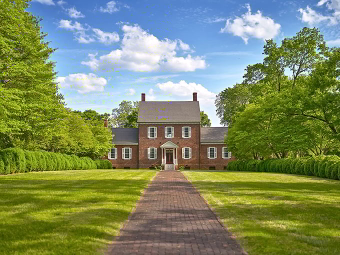 Ayr Mount stands proudly amid manicured grounds, its brick façade and symmetrical windows embodying the architectural elegance of a bygone era.