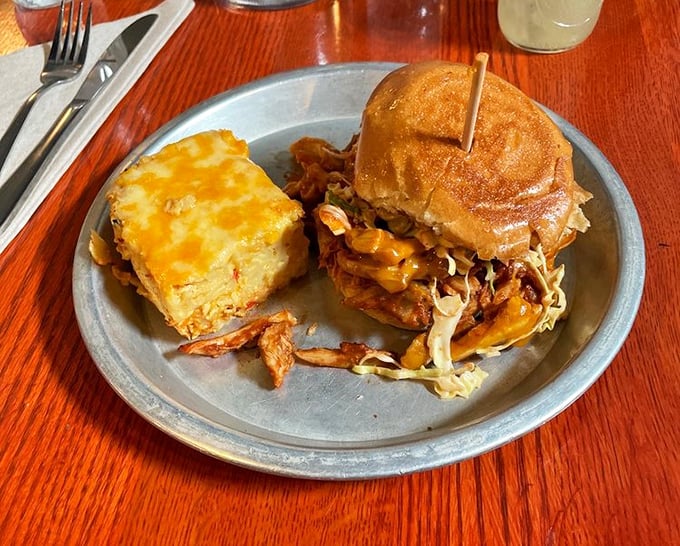 Melty cheese, tangy slaw, and tender chicken on a toasted bun—proof that sometimes the best relationships are the messiest ones. 