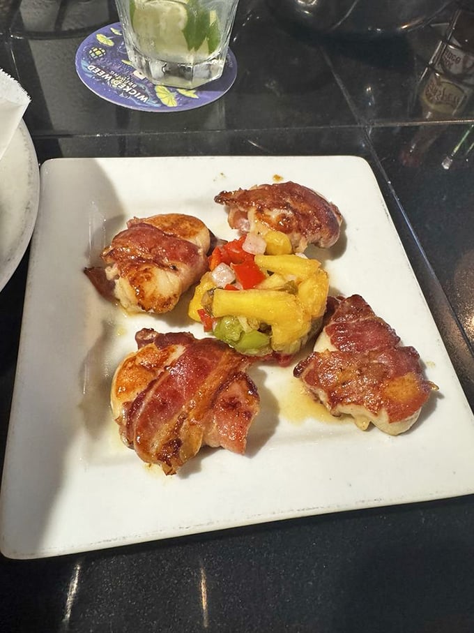 Bacon-wrapped scallops with tropical salsa—because sometimes two perfect things deserve to meet and fall in love on your plate.