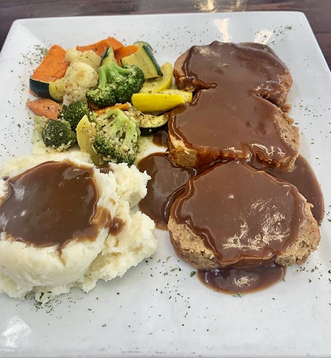 Meatloaf and mashed potatoes swimming in gravy—comfort food so nostalgic it should come with a playlist of songs your parents danced to.