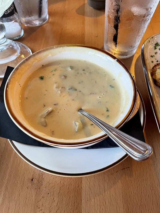 This isn't just potato soup—it's a warm hug in a bowl. Creamy, hearty, and studded with enough goodies to make you forget salads exist.