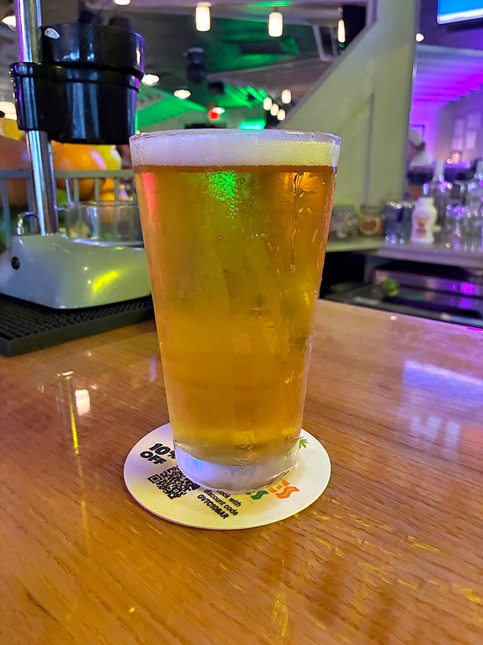 A perfectly poured beer with that ideal foam crown—the liquid equivalent of a warm welcome after a day at the beach.