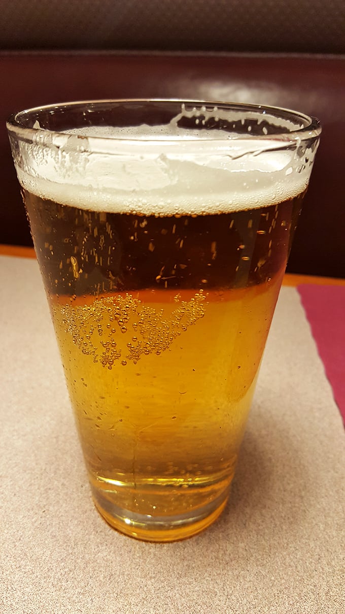 Cold beer waiting patiently to accompany that hot chicken – a partnership as old as time.