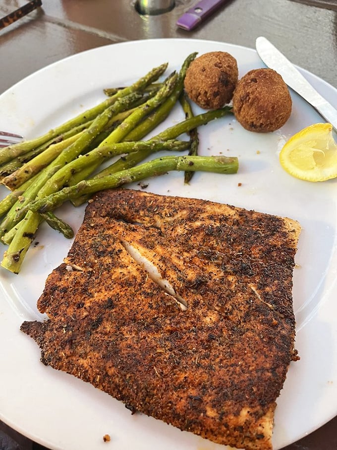 Blackened mahi with asparagus that makes eating healthy feel like cheating at life. Those spices aren't just sprinkled—they're applied with conviction.